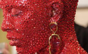 Doja Cat, alien covered in 30,000 red Swarovski crystals at PFW